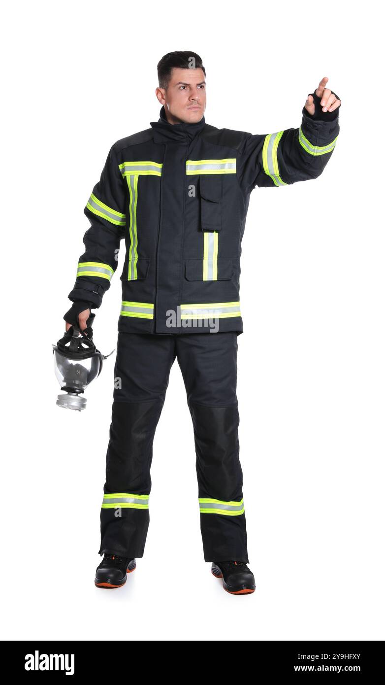 Firefighter in full uniform with mask hi-res stock photography and ...