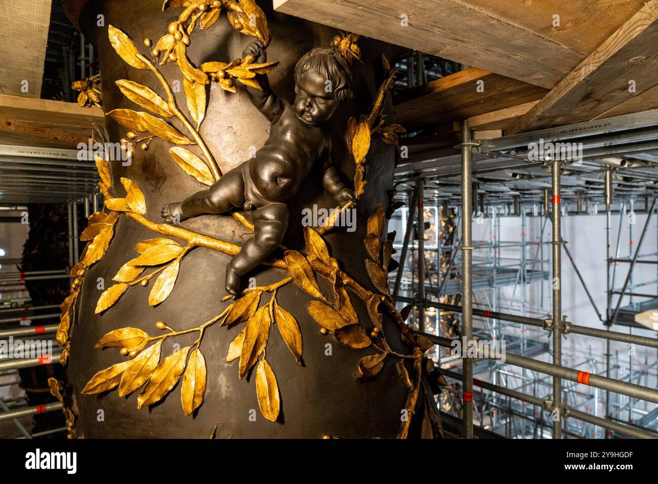 A detail of the St. Peter's Baldachin, a baroque sculpted bronze canopy ...