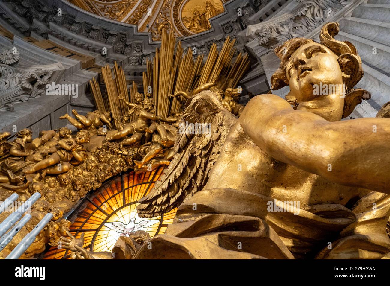 A detail of the Altar of the Chair of St. Peter surrounded by ...