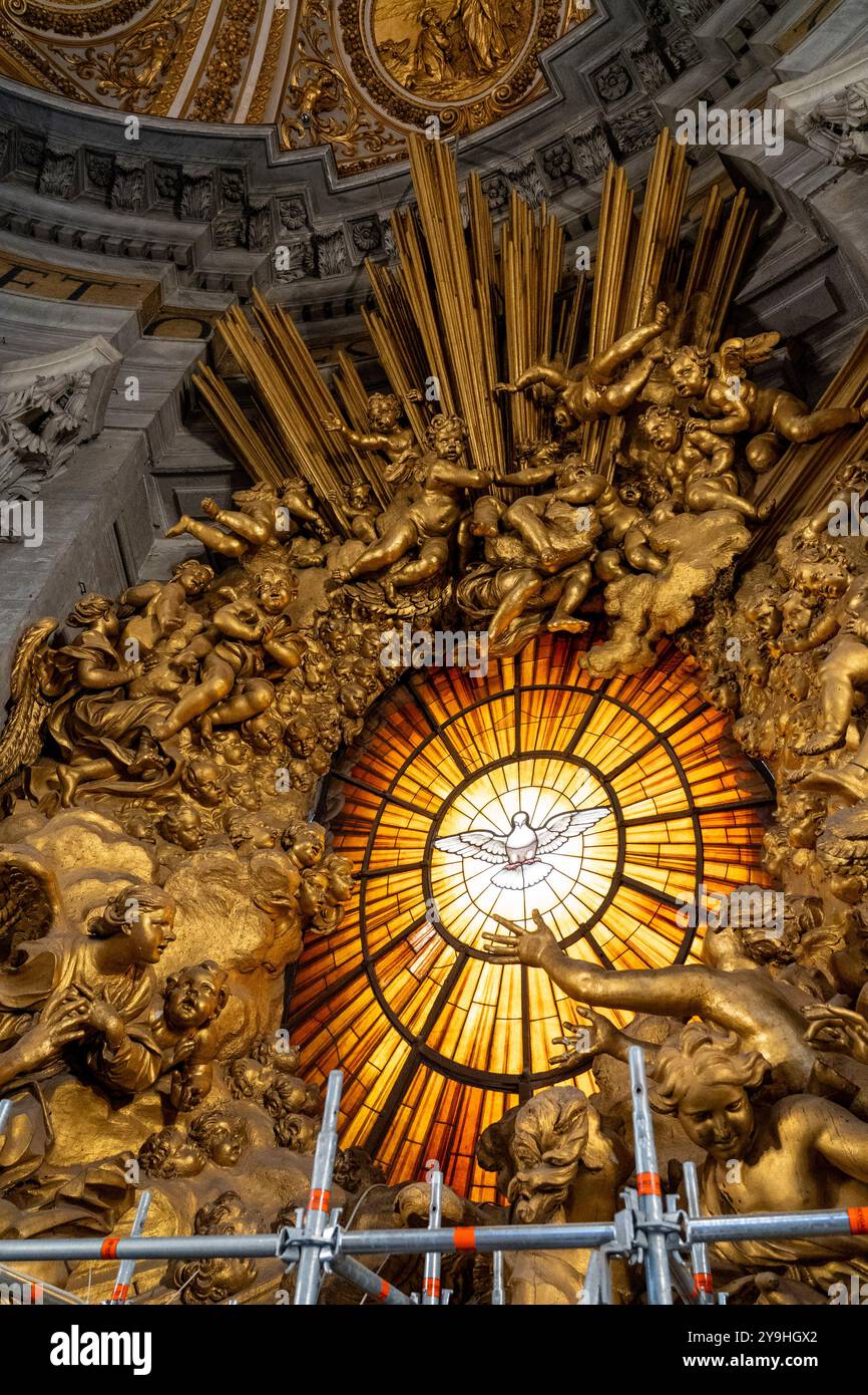 A detail of the Altar of the Chair of St. Peter surrounded by ...