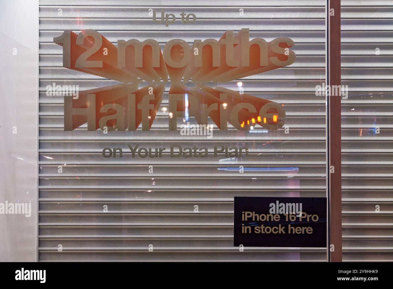 Storefront advertisement offering 12-month half-price deals on data ...