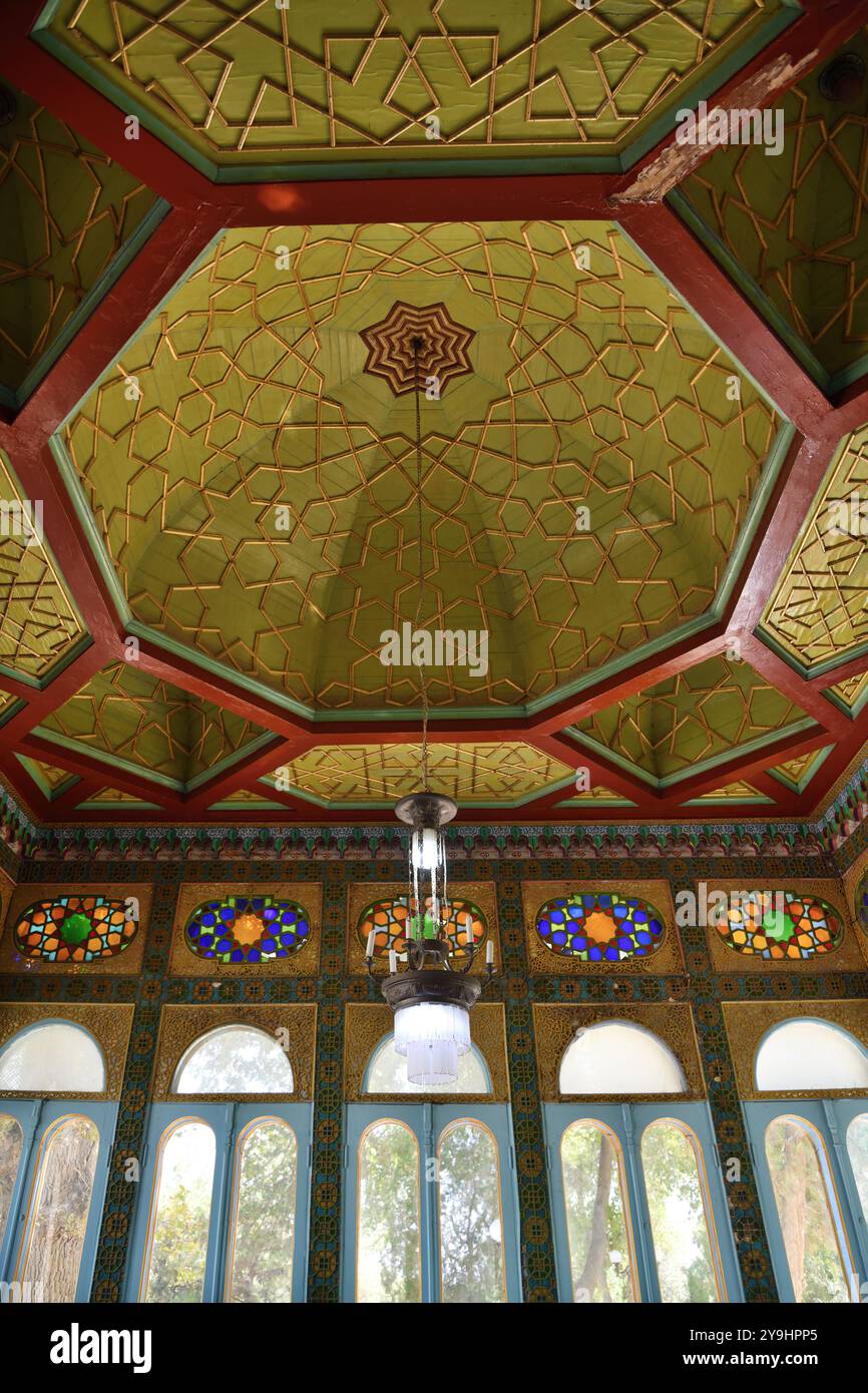 The small chamber with large glass windows and carved wooden ceiling in ...