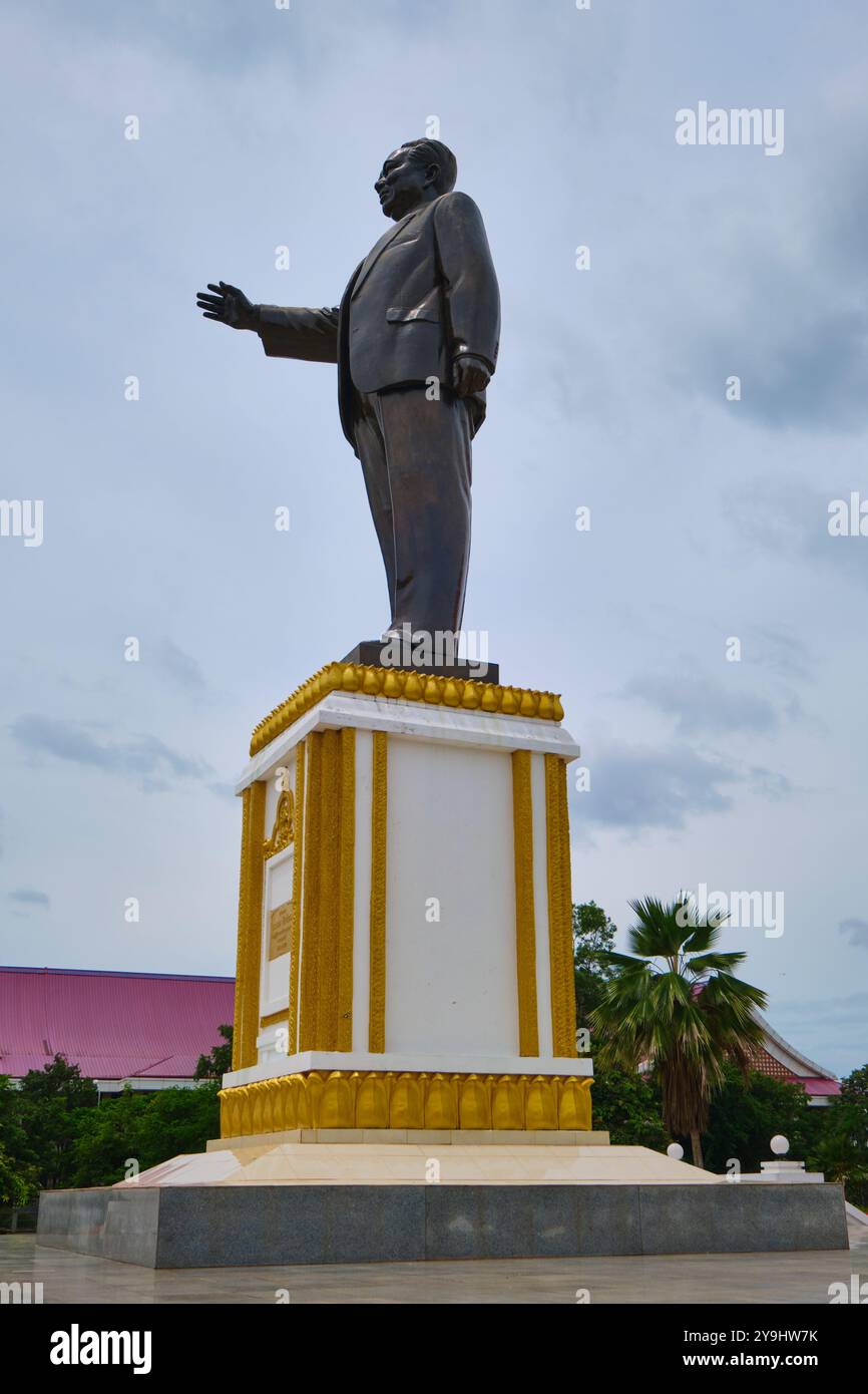 Side view of standing bronze statue of the great leader in front of the ...