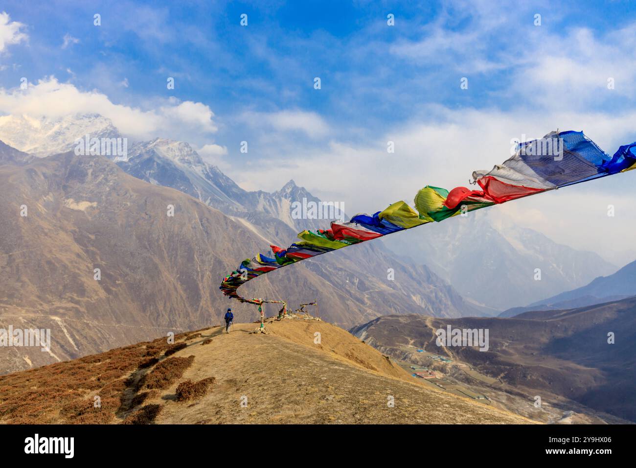 Traditional tibetian prayer flags in Himalaya mountains in Nepal. Beautiful scenery of mountains ...