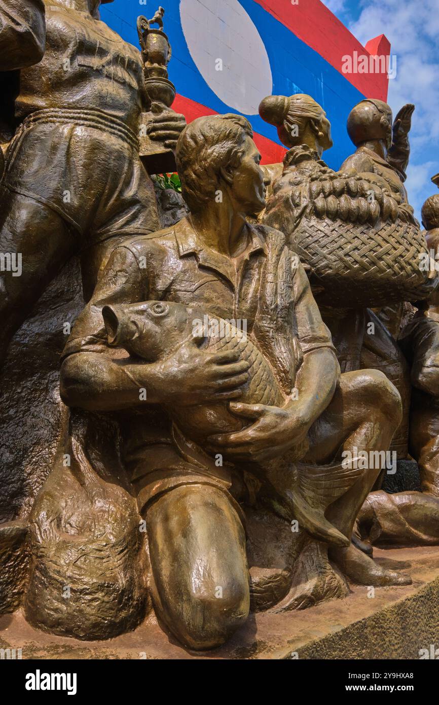 Patriotic monument, statue of independence, including a man with a fish ...