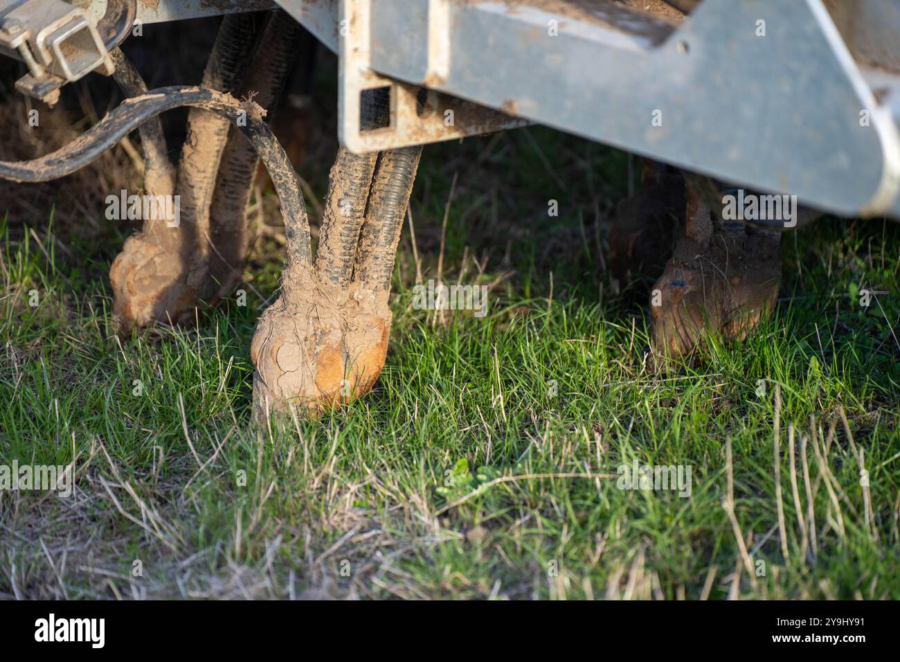 seed drill AIR SEEDER on a farm on an agriculture ranch in spring on a ...