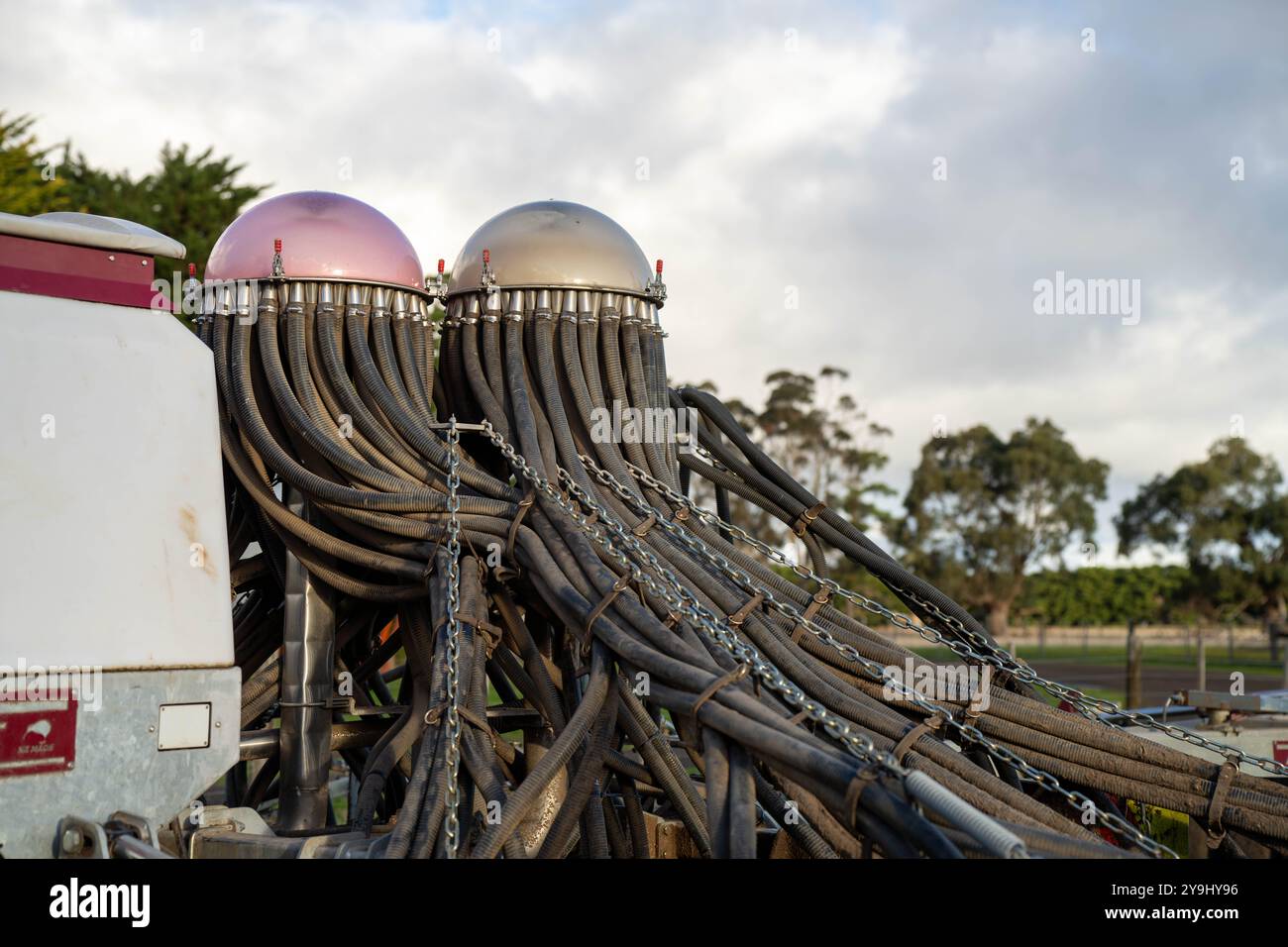 seed drill AIR SEEDER on a farm on an agriculture ranch in spring on a ...