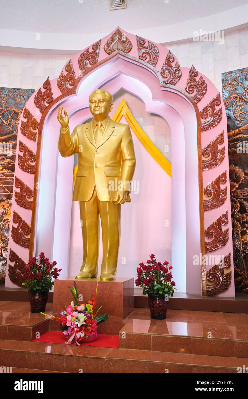 A gallery featuring a life size, gold statue of the first communist ...