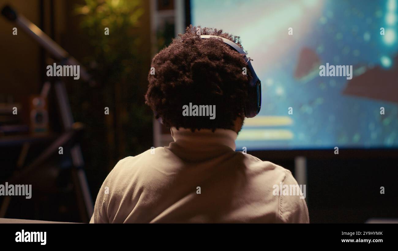 Player enjoys game with spaceship shooting laser streams using ...