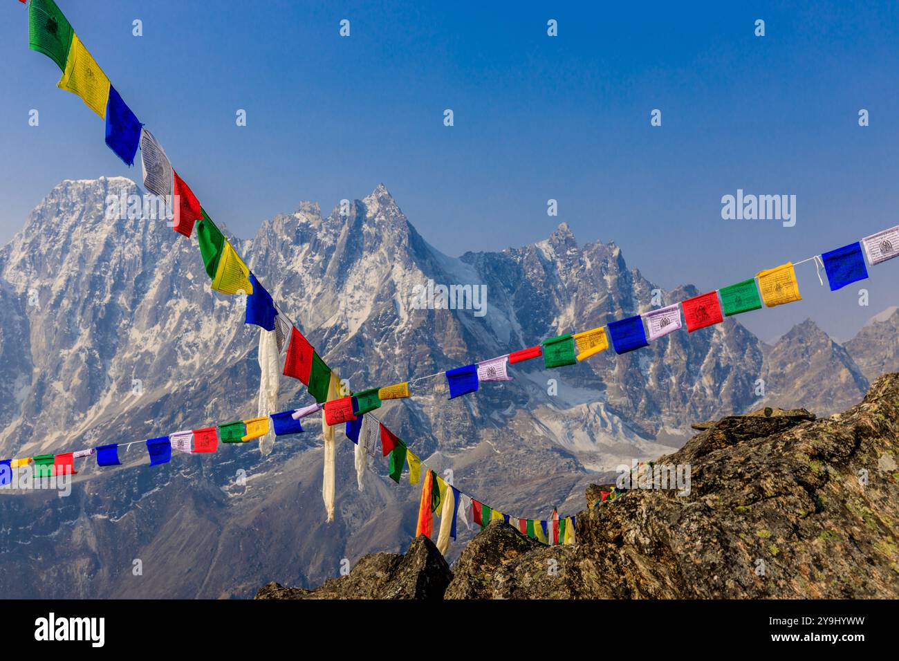 Traditional tibetian prayer flags in Himalaya mountains in Nepal ...