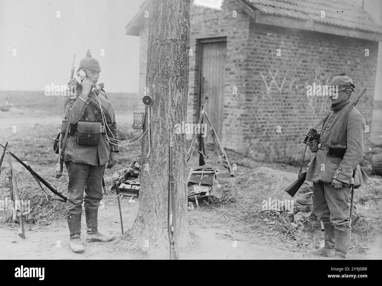 German soldier in field on th phone installation. VIintage WWI photograph of German soldiers ...