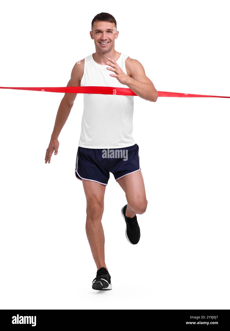 Man in sportswear crossing red finish line on white background Stock ...