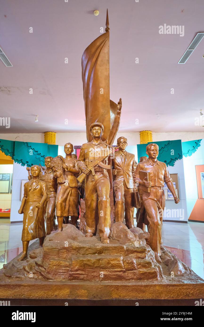 A bronze statue of people involved in the communist revolution for ...