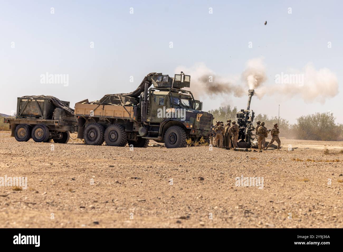 U.S. Marines with 2nd Battalion, 11th Marines Regiment, conduct firing ...