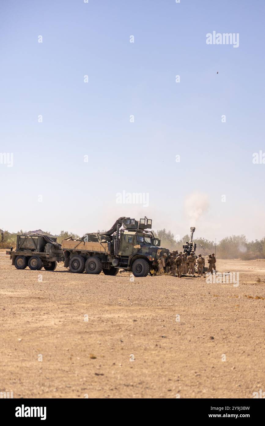 U.S. Marines with 2nd Battalion, 11th Marines Regiment, conduct firing ...