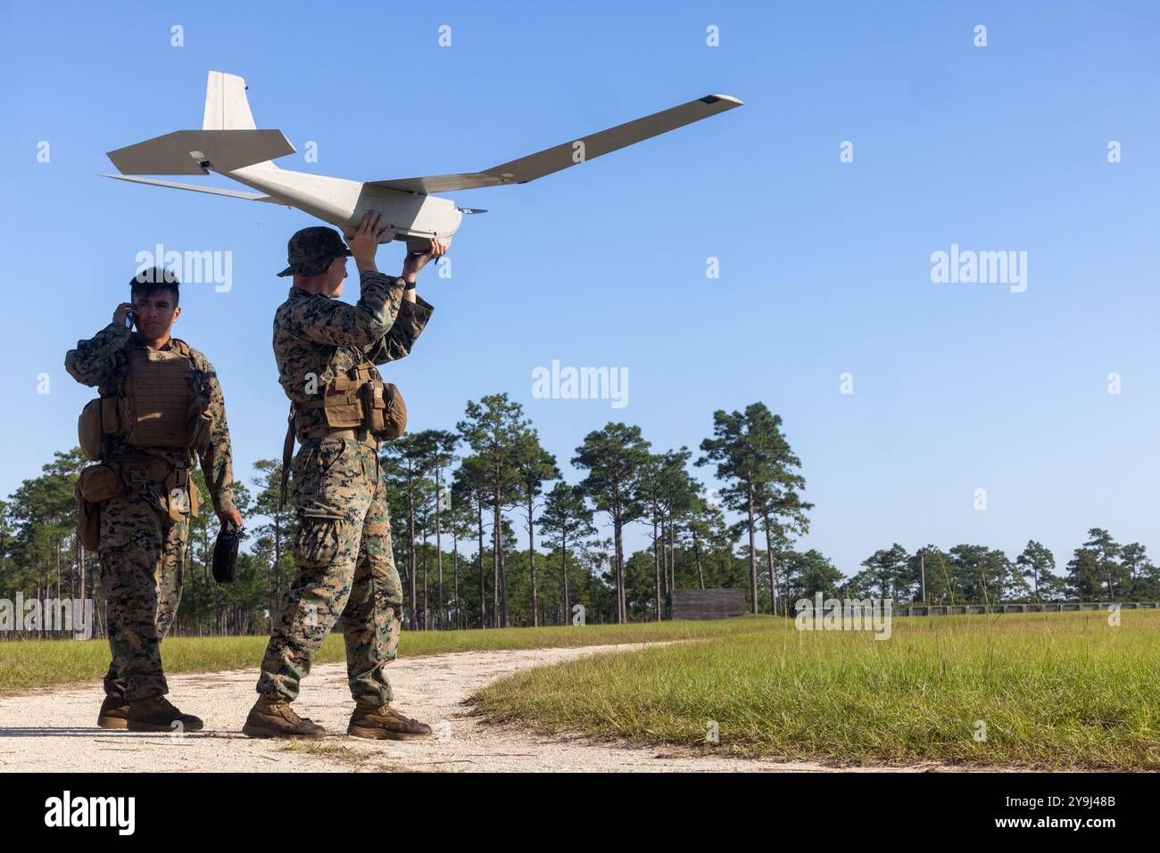 U.S. Marine Corps Lance Cpl. Axel Cuencareyes, left, and Lance Cpl ...