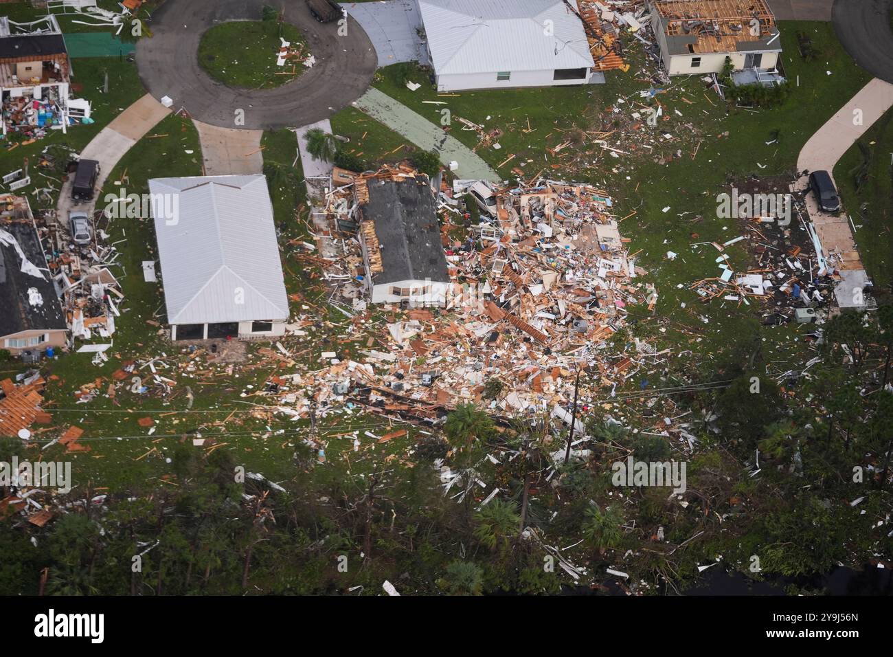 Neighborhoods destroyed by tornadoes are seen in this aerial photo in ...