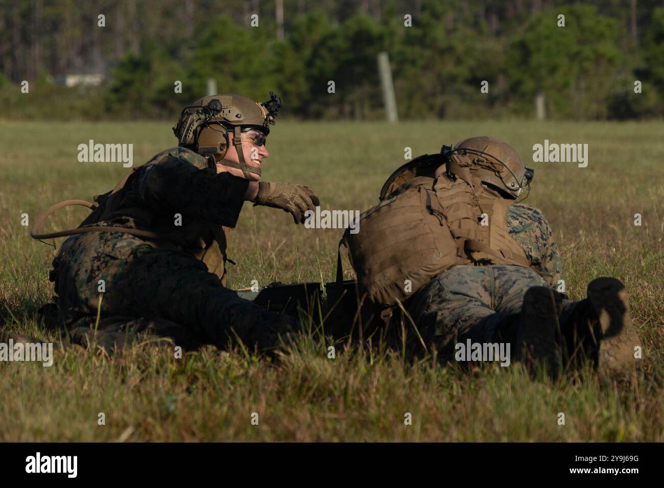 U.S. Marine Corps Lance Cpl. Finbar Kyne, left, a machine gunner with ...