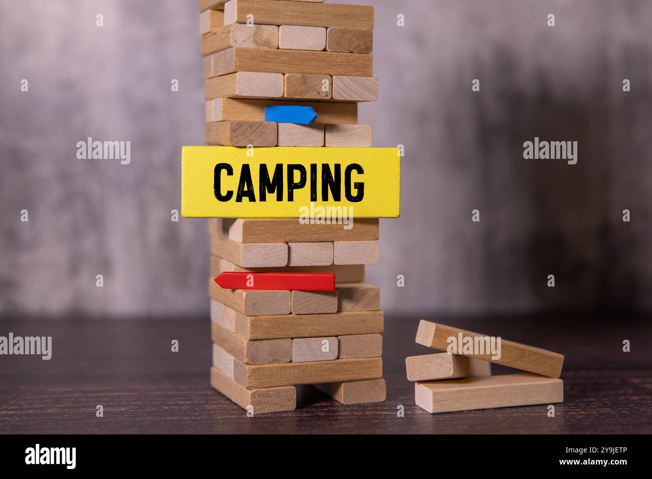 word camping written in small wooden alphabet cubes on isolated white ...