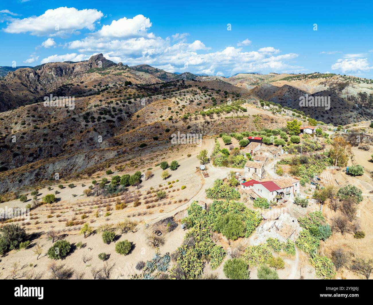 Mountains and Olive groves around Ghost Town from a drone, Pentedattilo ...