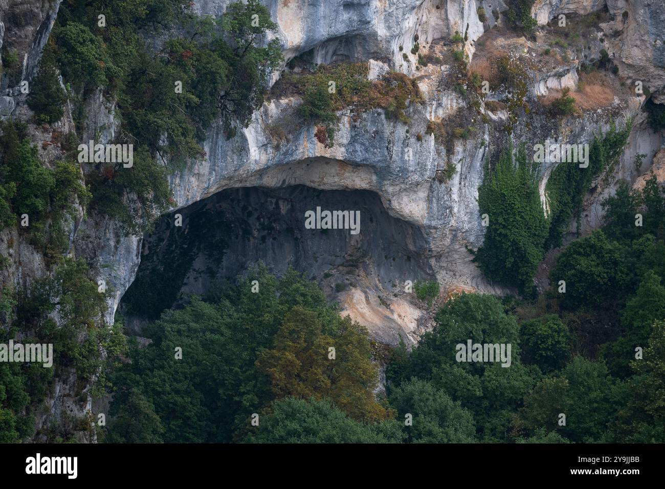 Natural Cave Formation Nestled within the Limestone Cliffs of the ...