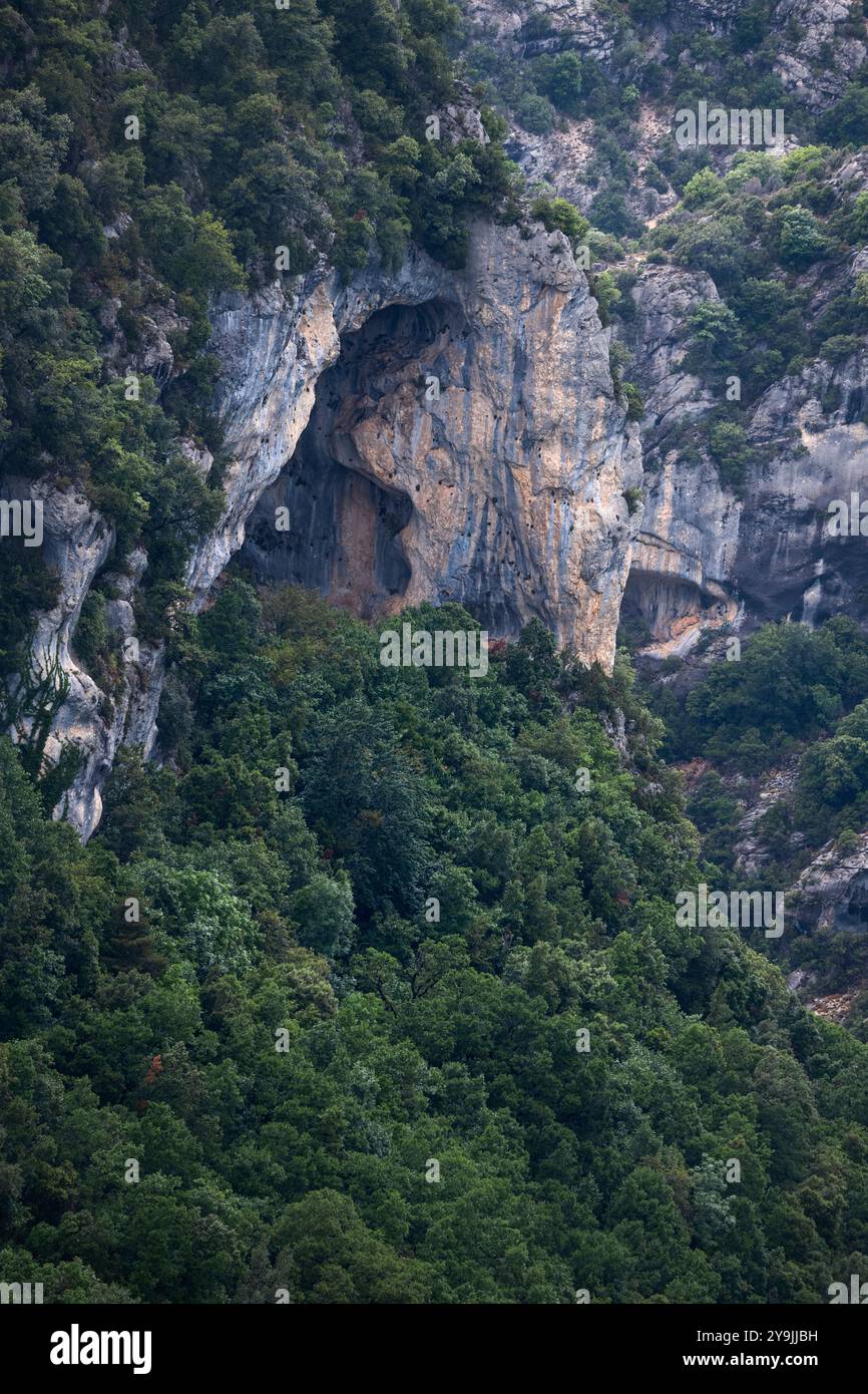 Natural Cave Formation Nestled within the Limestone Cliffs of the ...