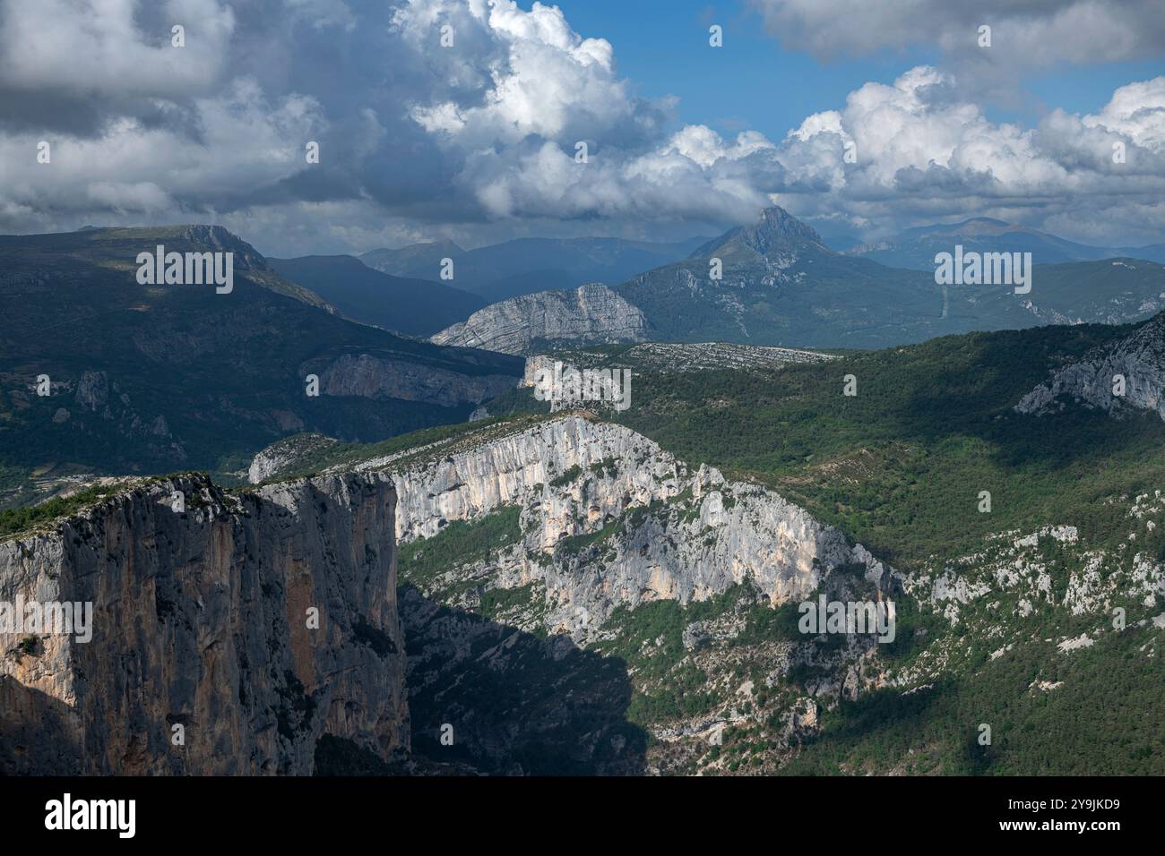 Verdant Cliffs and Caves of Verdon Gorge in France, with sunlight ...