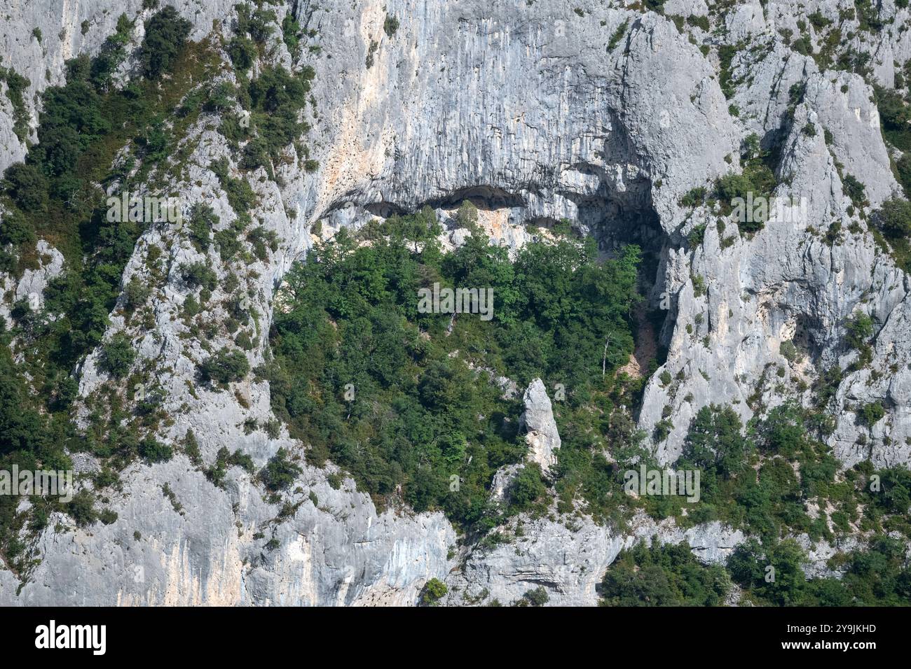 Natural Cave Formation Nestled within the Limestone Cliffs of the ...