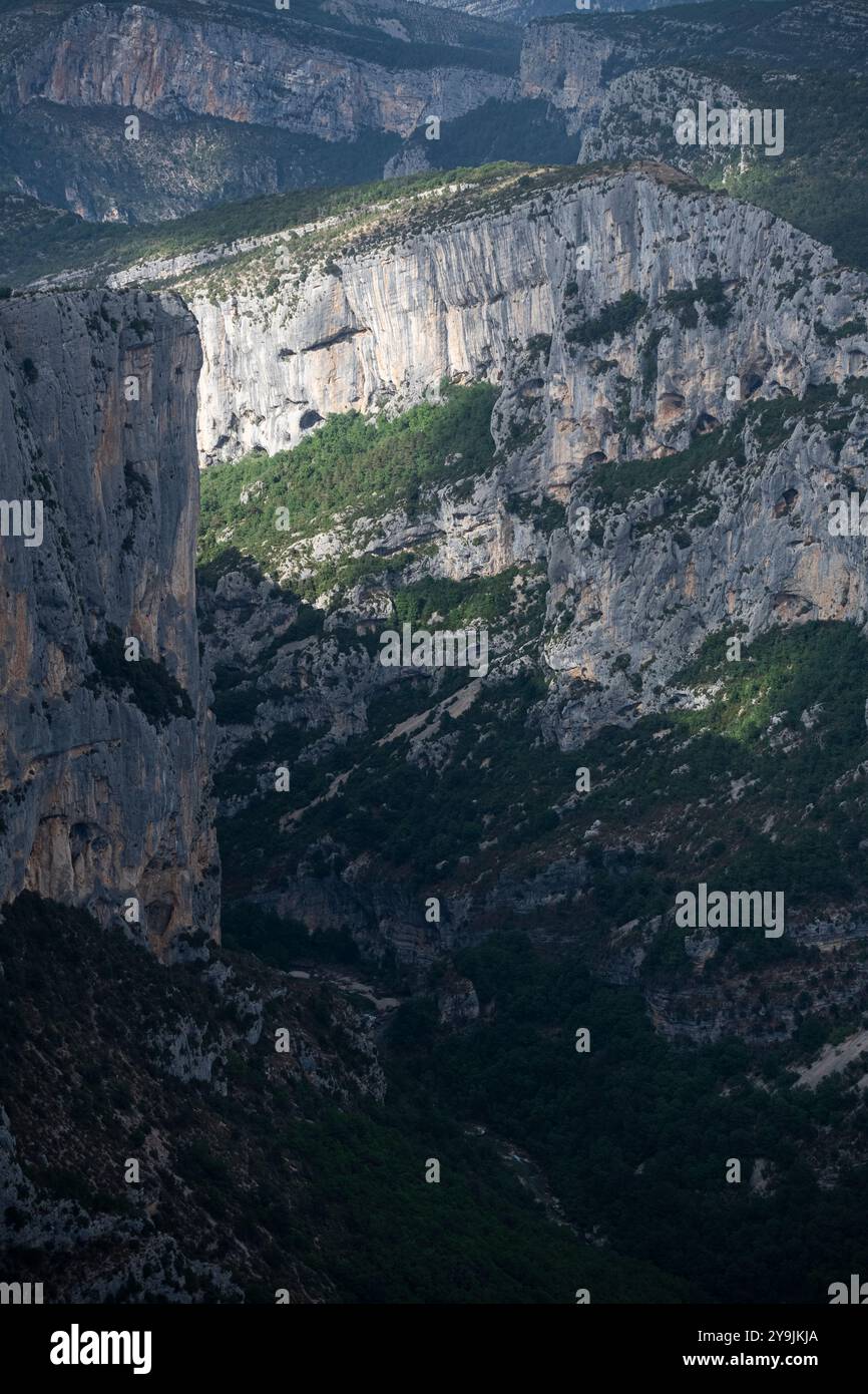 Verdant Cliffs and Caves of Verdon Gorge in France, with sunlight ...