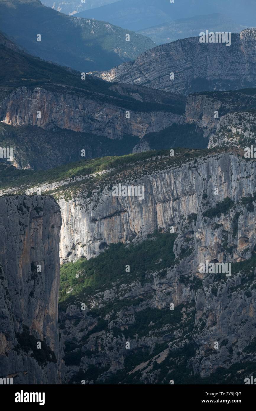 Verdant Cliffs and Caves of Verdon Gorge in France, with sunlight ...