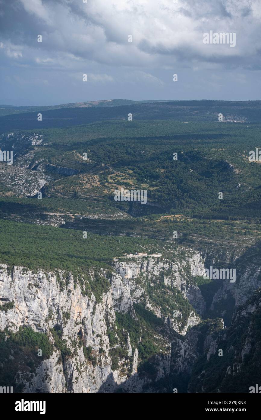 Verdant Cliffs and Caves of Verdon Gorge in France, with sunlight ...