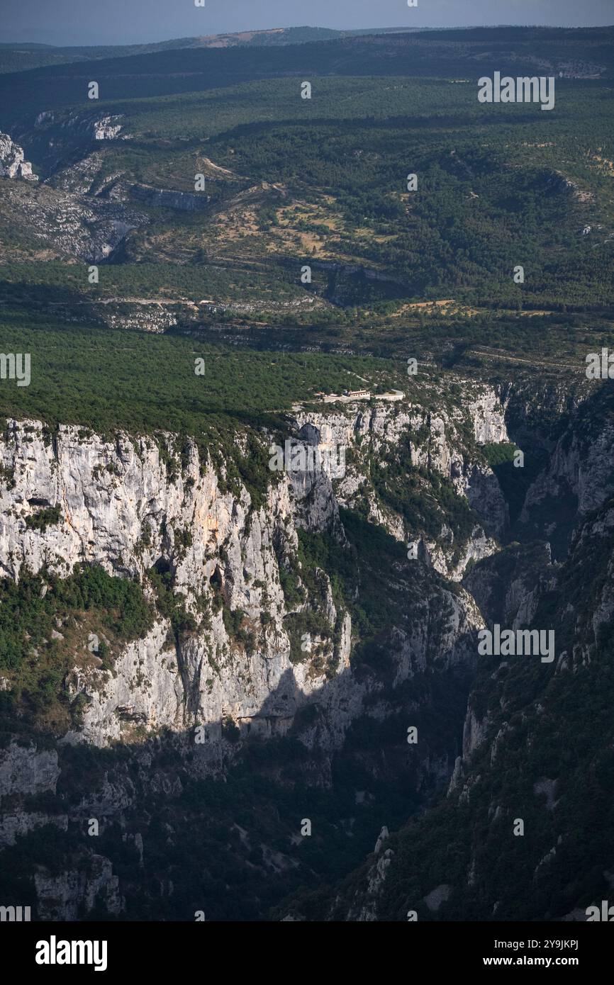 Verdant Cliffs and Caves of Verdon Gorge in France, with sunlight ...