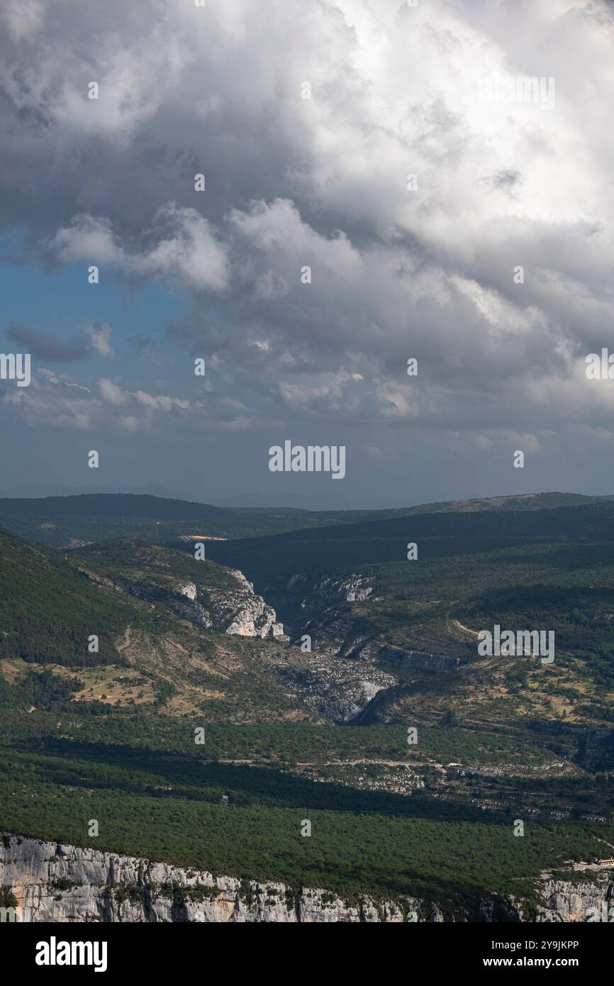 Verdant Cliffs and Caves of Verdon Gorge in France, with sunlight ...