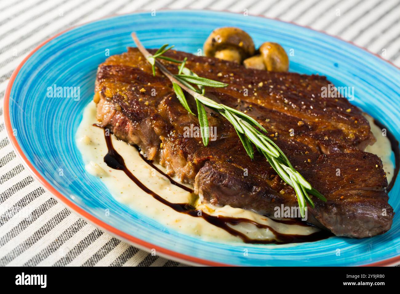 Image of beef entrecote with mushroom sauce Stock Photo - Alamy