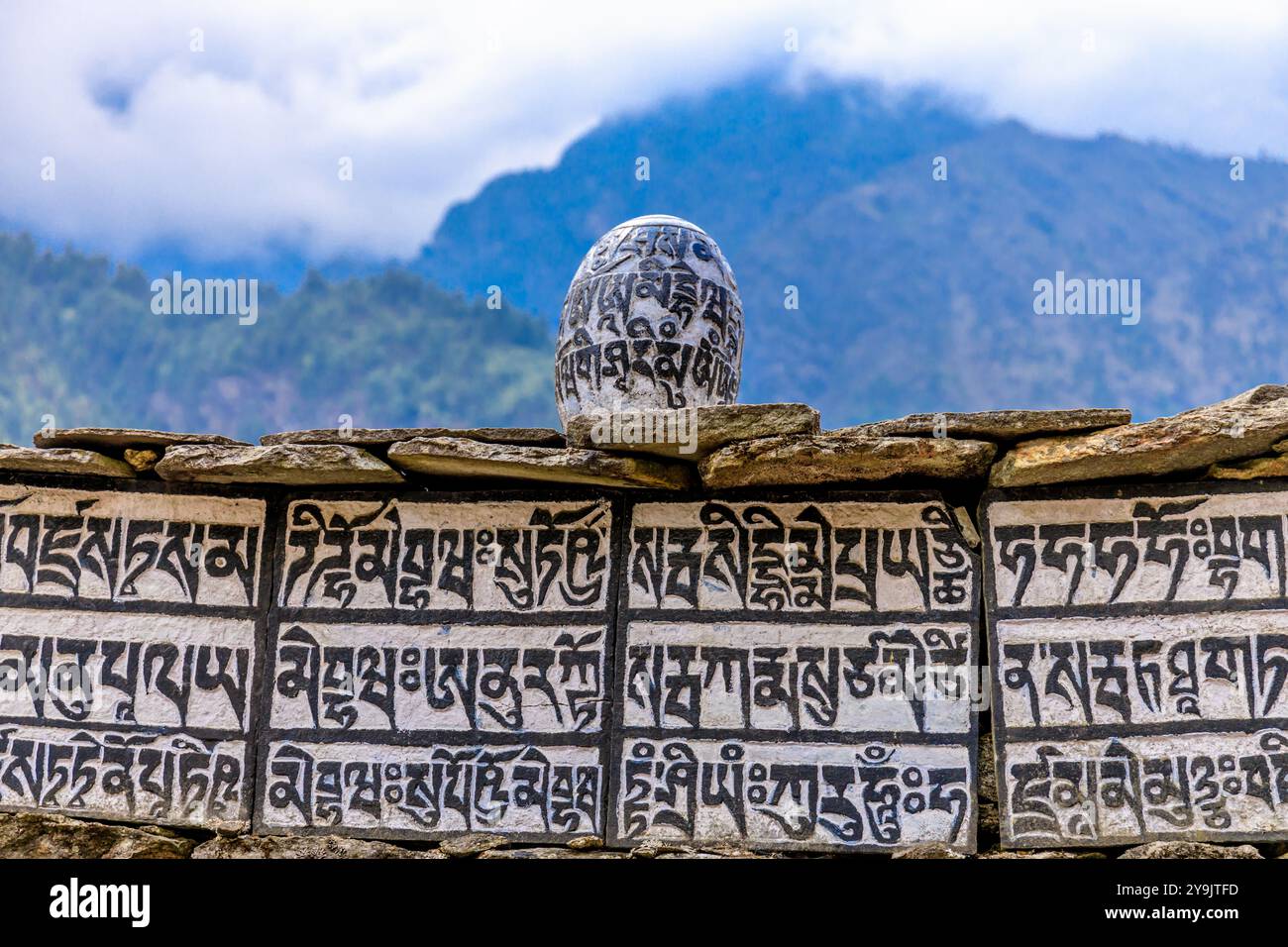 Mani stones with sacred symbols in Nepal Himalaya mountains standing ...