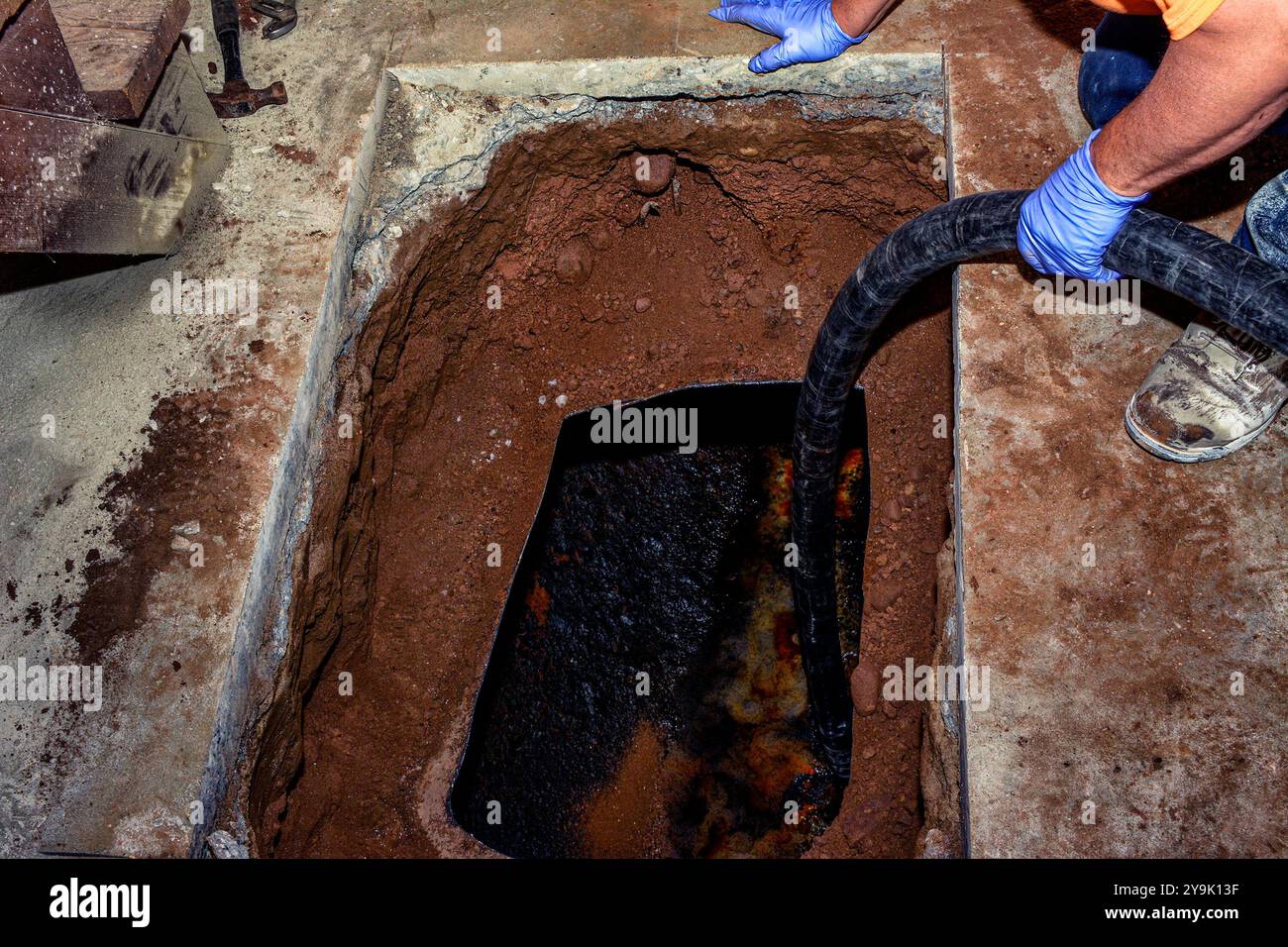 Oil tank decommissioning: Pumping out buried tank to remove old heating ...