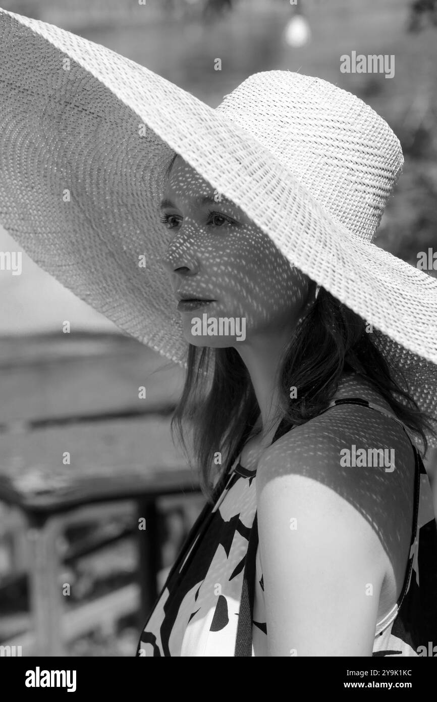 Wide straw hat Black and White Stock Photos & Images - Alamy