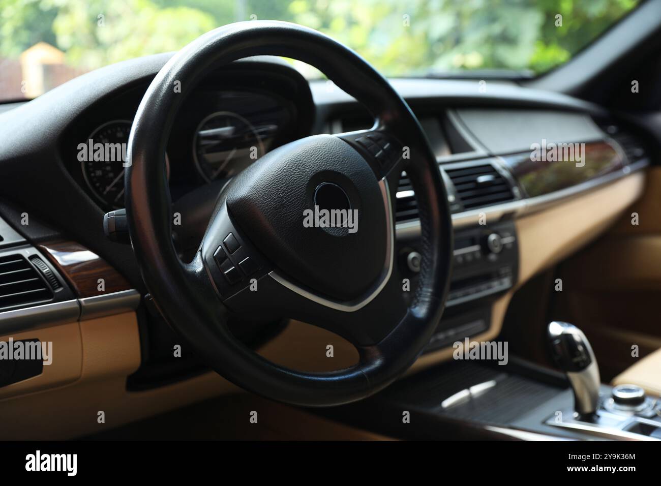Steering wheel in modern car, view from inside Stock Photo - Alamy