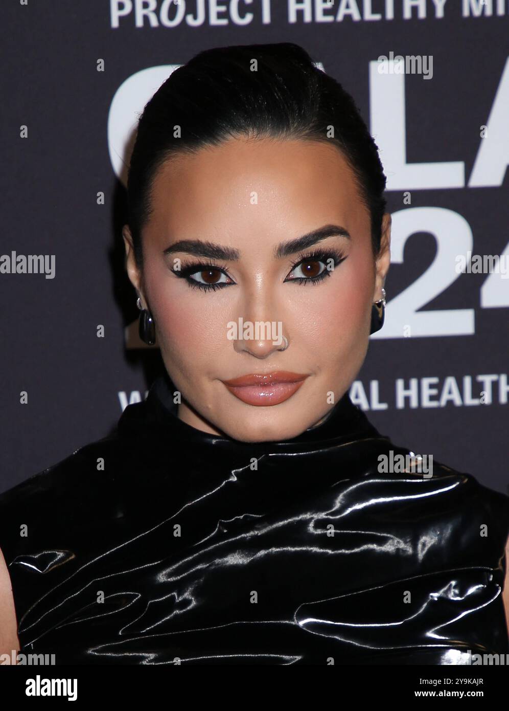 Demi Lovato attending Project Healthy Minds' World Mental Health Day ...