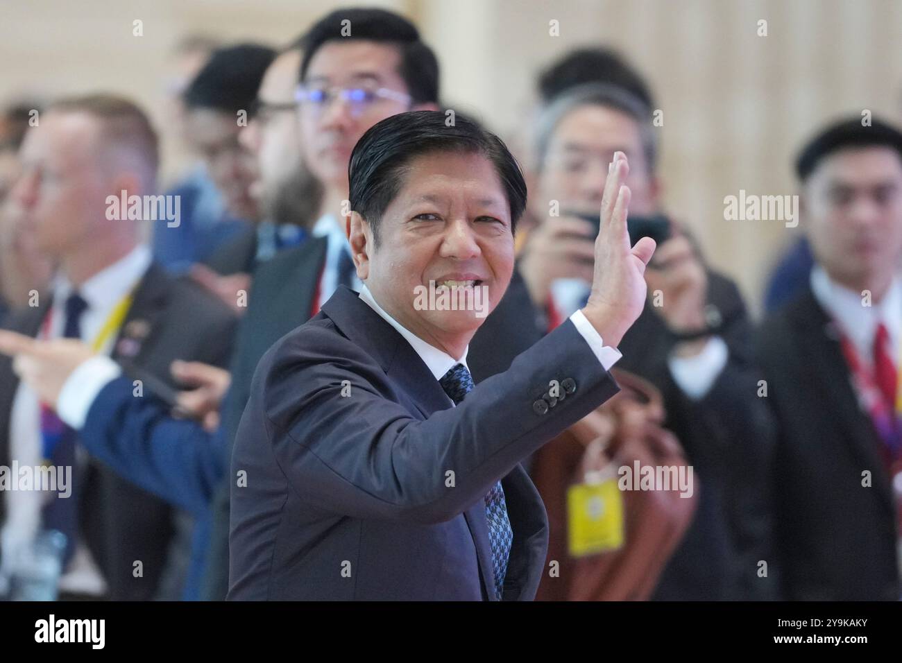 Philippine President Ferdinand Marcos Jr. waves as he arrives for the ...