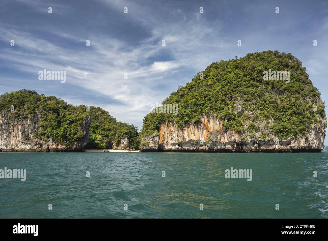 Tropical islands view with ocean blue sea water and white sand beach at ...