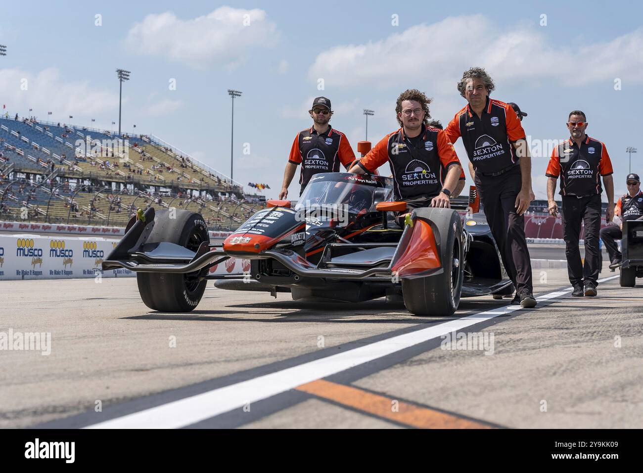 The crew of AJ Foyt Racing Chevrolet prepare their race cars for the Hy ...