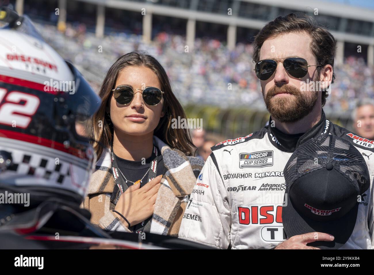 NASCAR Cup Series Driver Ryan Blaney (12) stands for the prayer for the ...