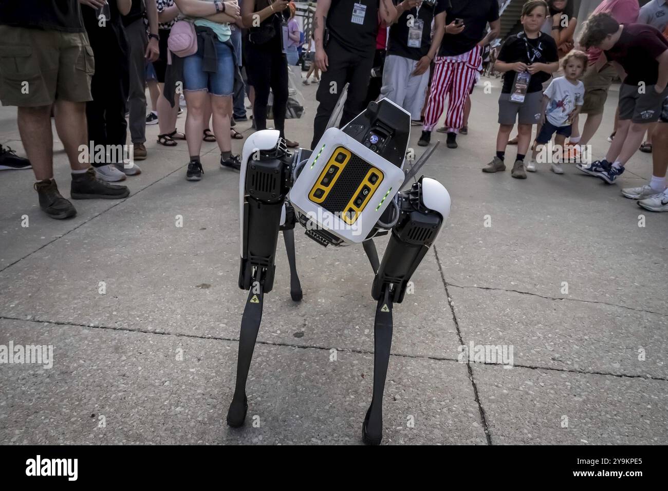 Robot walks through crowd people hi-res stock photography and images ...