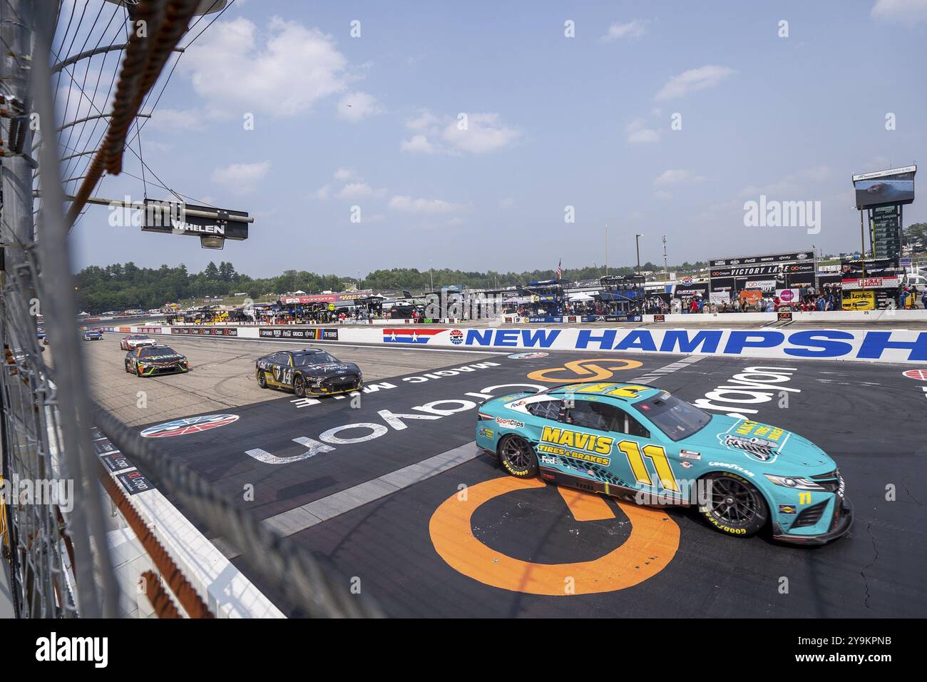 NASCAR Cup Driver Denny Hamlin (11) races for position for the Crayon ...