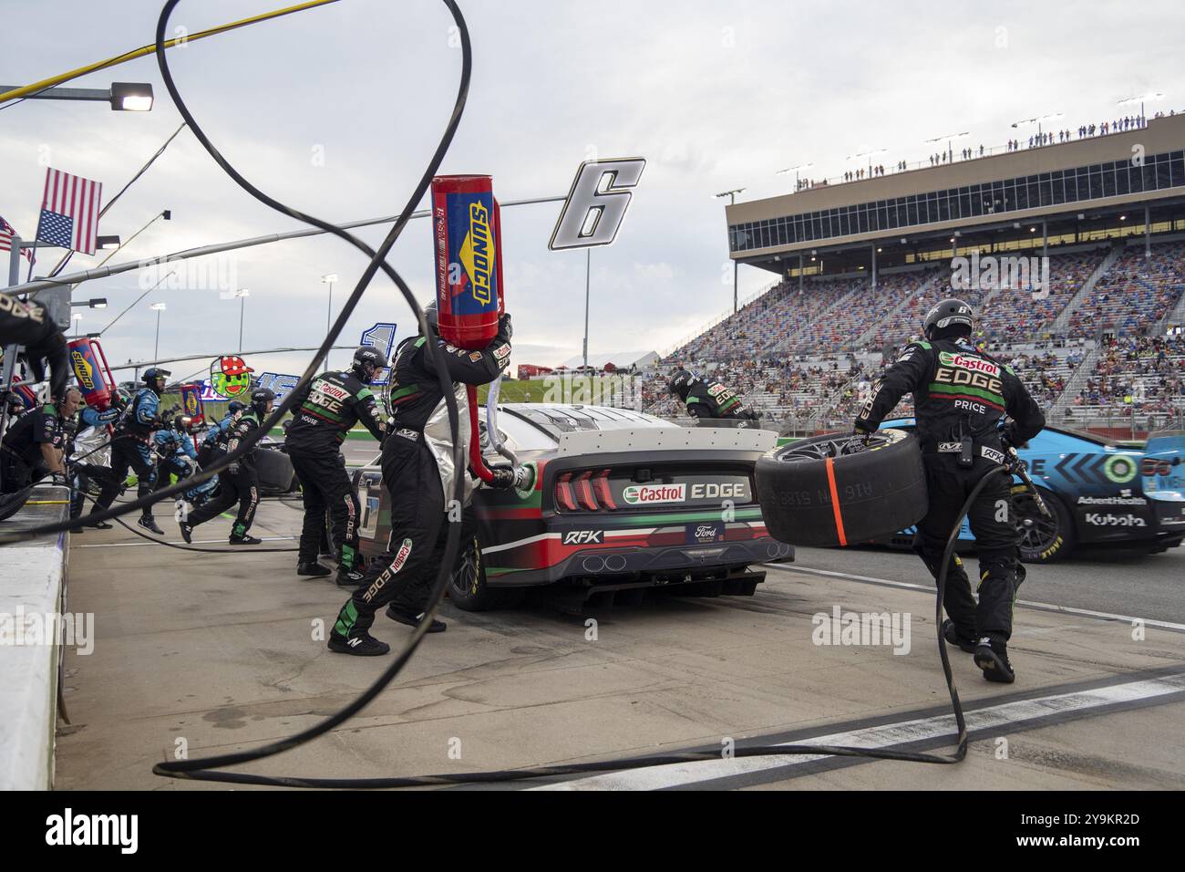 NASCAR Cup Driver, Brad Keselowski (6) and crew make a pit stop for the ...