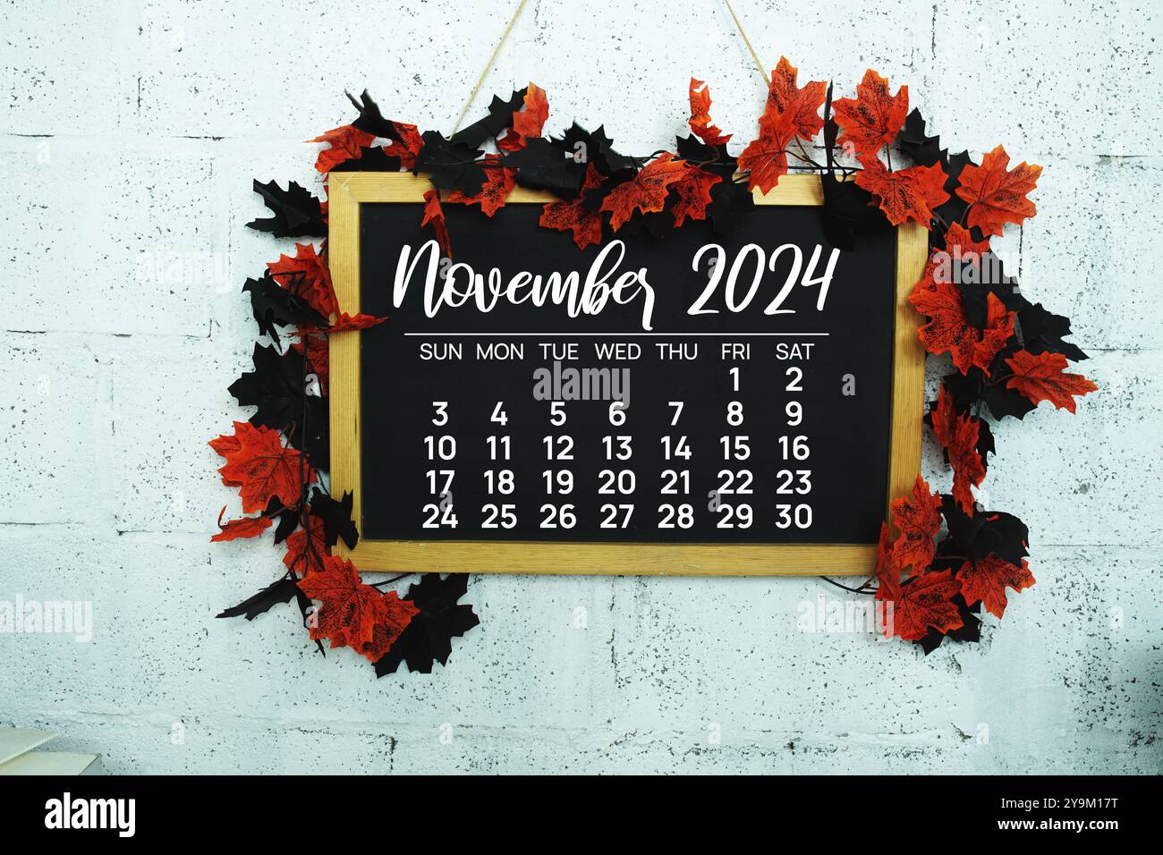 November 2024 monthly calendar with maple leaf decoration Stock Photo ...