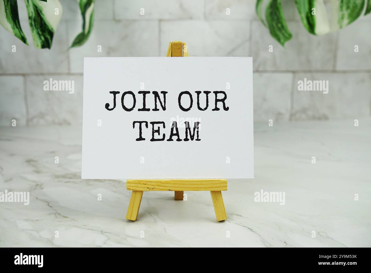 Join Our Team text on paper card with wooden easel stand Stock Photo ...