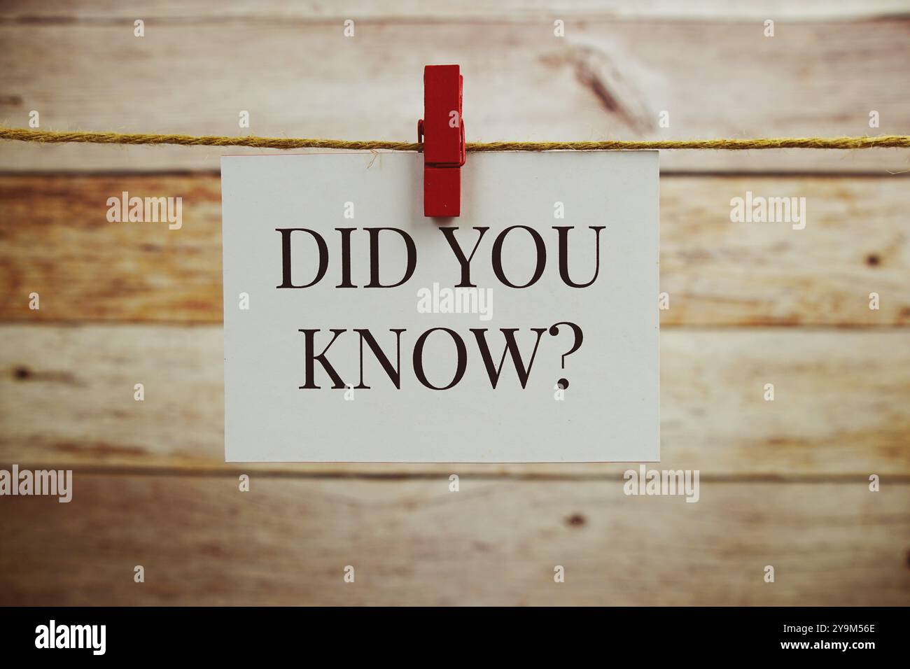 Did you know? text on paper card hanging on the wall with Clothespins ...