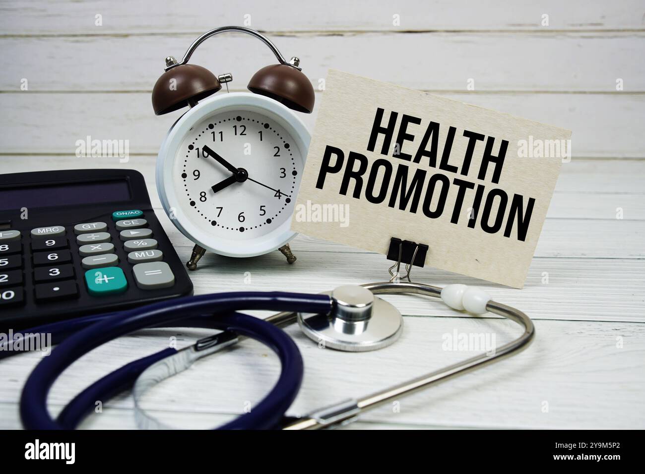Health Promotion text message on paper card with stethoscope ...